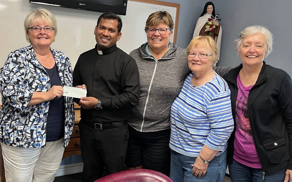 Ladies of St. Anne donate to CLC - The County